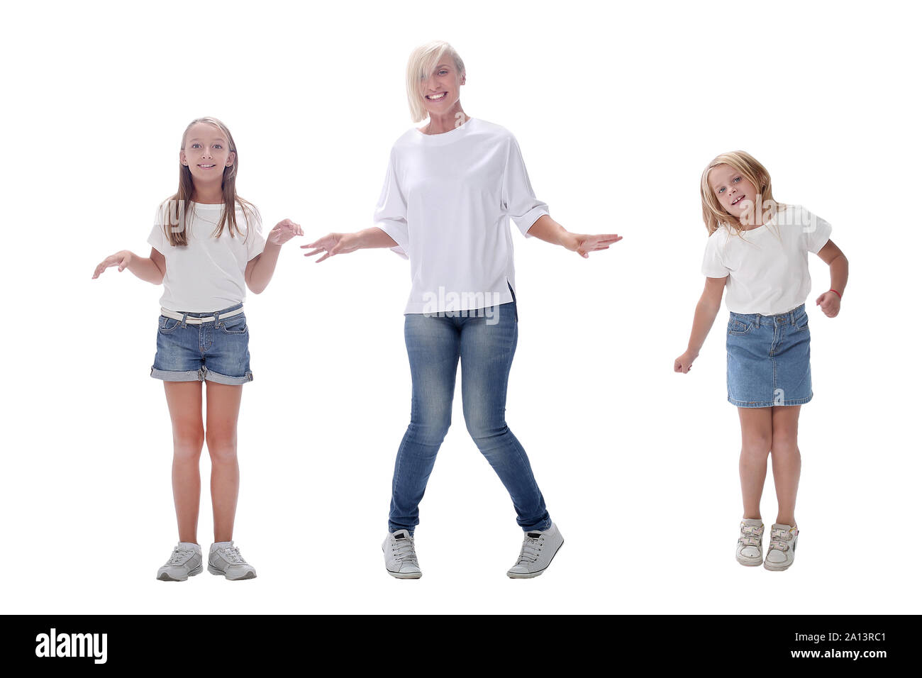 in full growth. happy dancing family . isolated on white Stock Photo ...