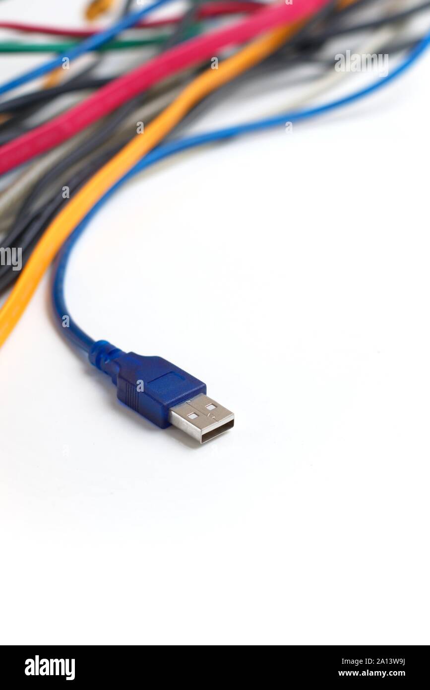 Data transfer computer connector with tangled cables on white ...