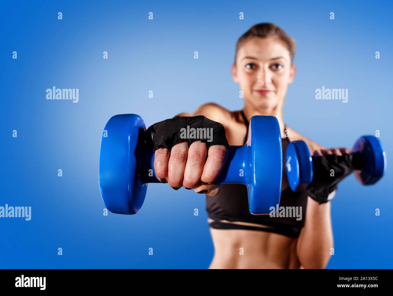 Determinated girl at the gym ready to start fitness lesson Stock Photo ...
