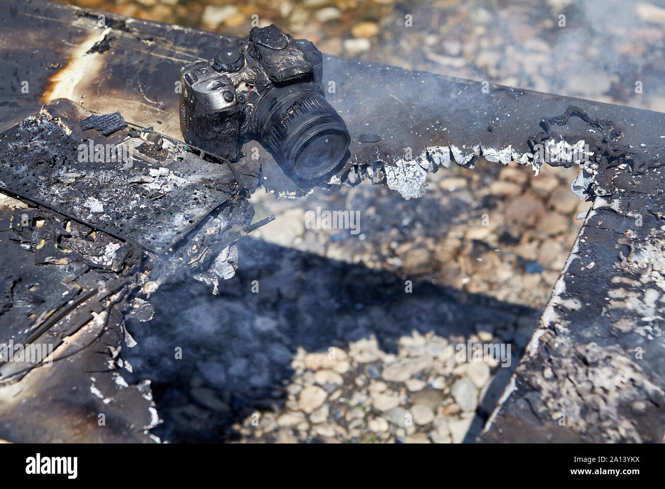 The aftermath of a forest fire that spread to a campsite for hiking ...