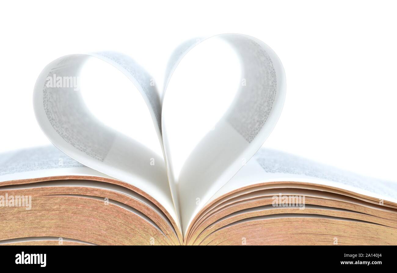 Close crop of a bible with pages making a heart. Isolated on white ...