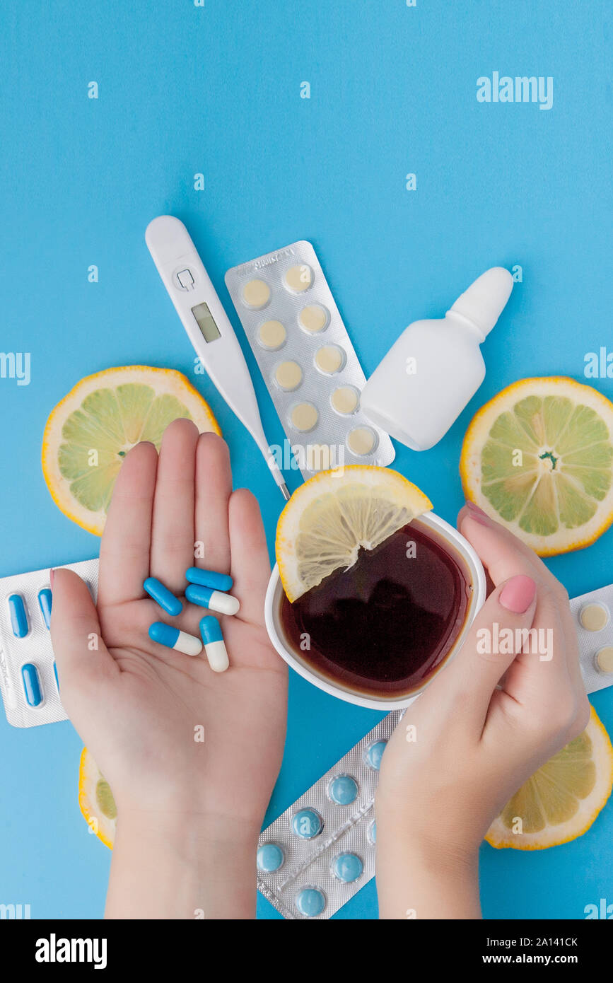 Medications, pills, thermometer, traditional medicine for treating ...