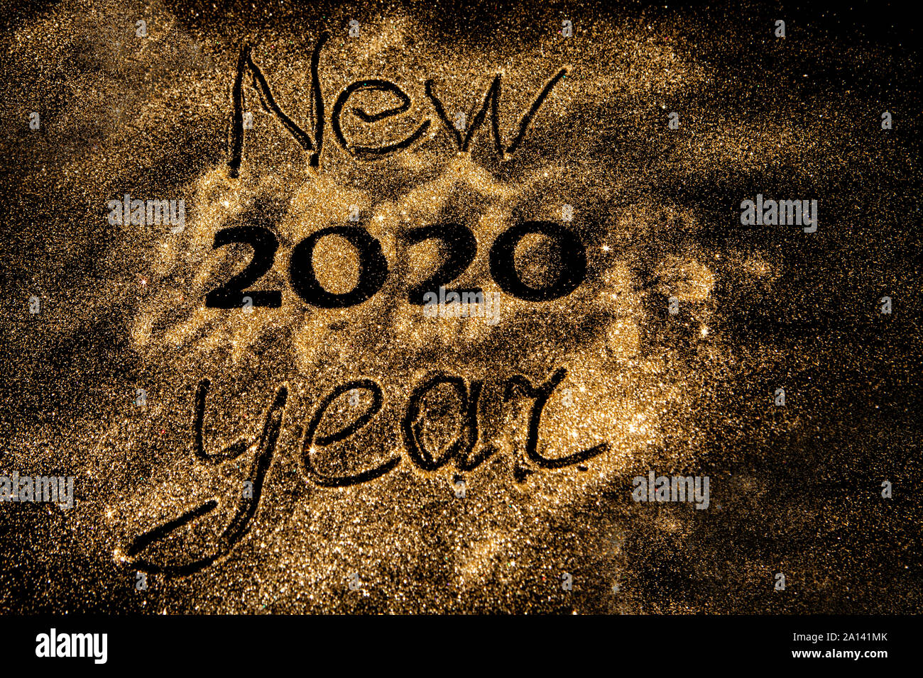 Happy New Year 2020. Beautiful sparkling Golden number 2020 on black ...
