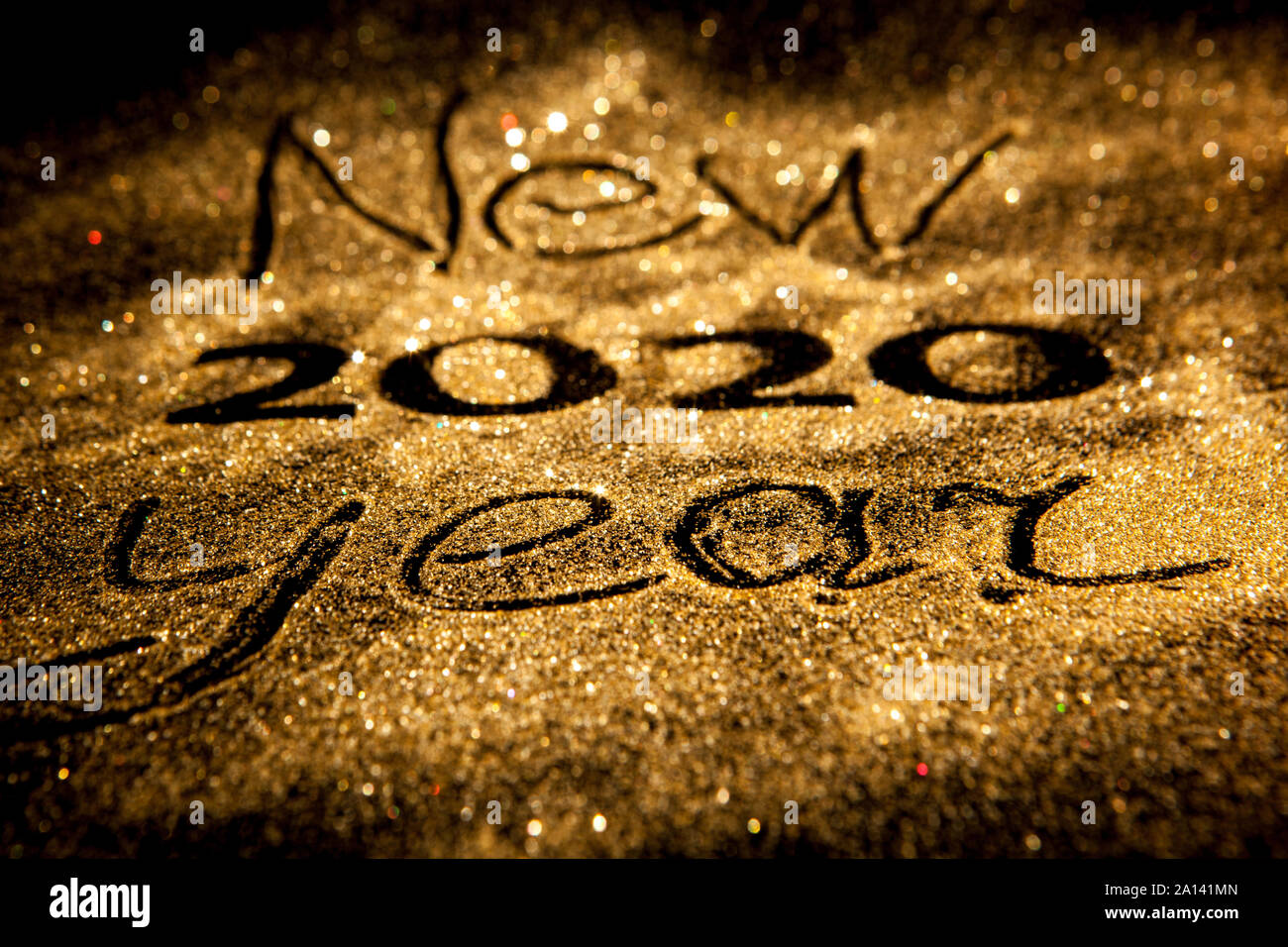Happy New Year 2020. Beautiful sparkling Golden number 2020 on black ...