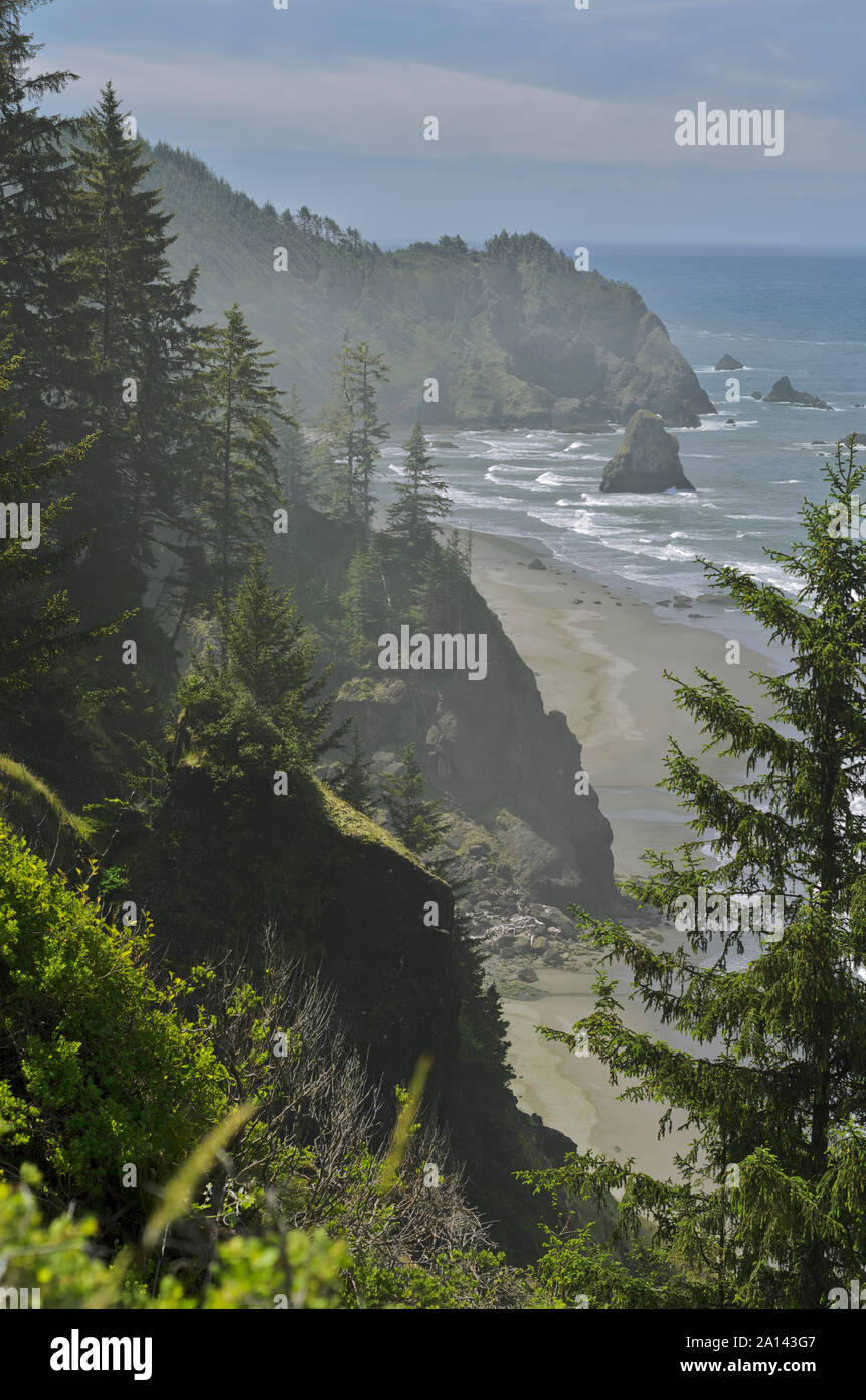 Wide cliff views over an isolated beach at Arch Rock,in the Boardman ...