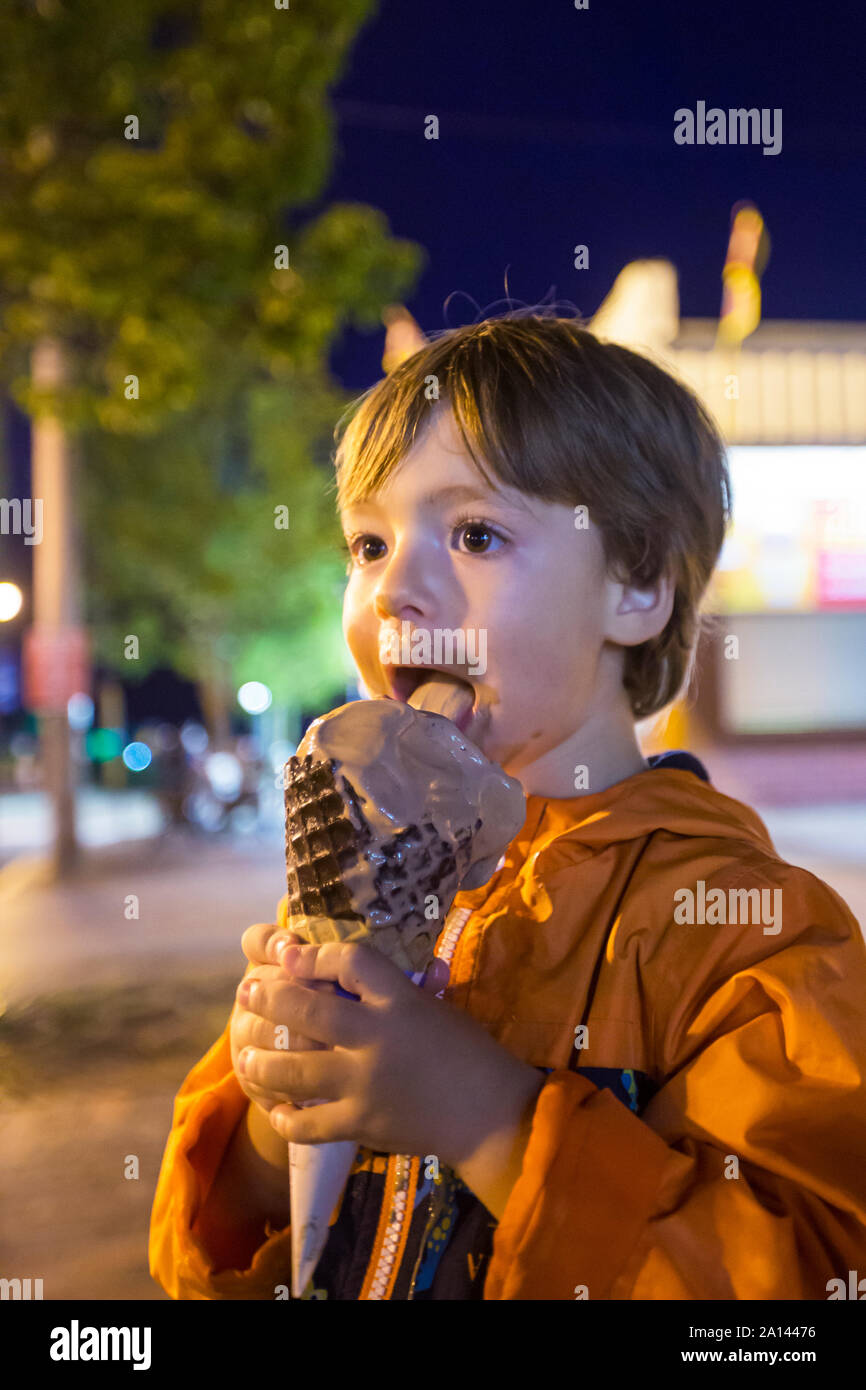 Ice cream cone child face messy hi-res stock photography and images - Alamy