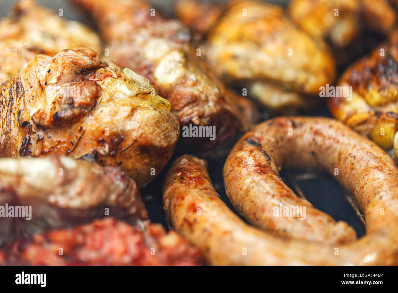 Barbeque grill mixed meat cooking on open air Stock Photo - Alamy