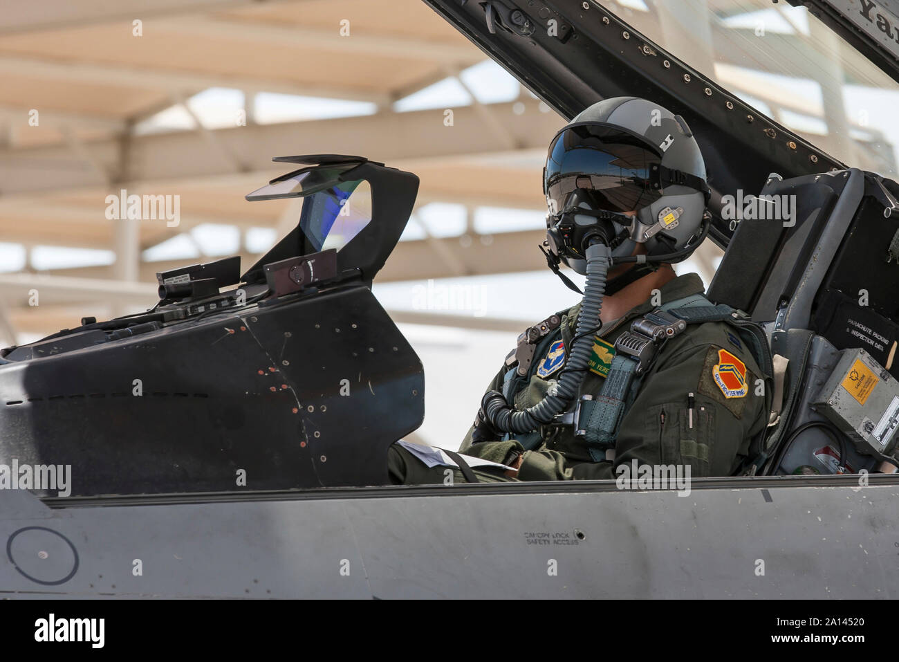 An F-16 pilot of the 310th Fighter Squadron prepares for another ...