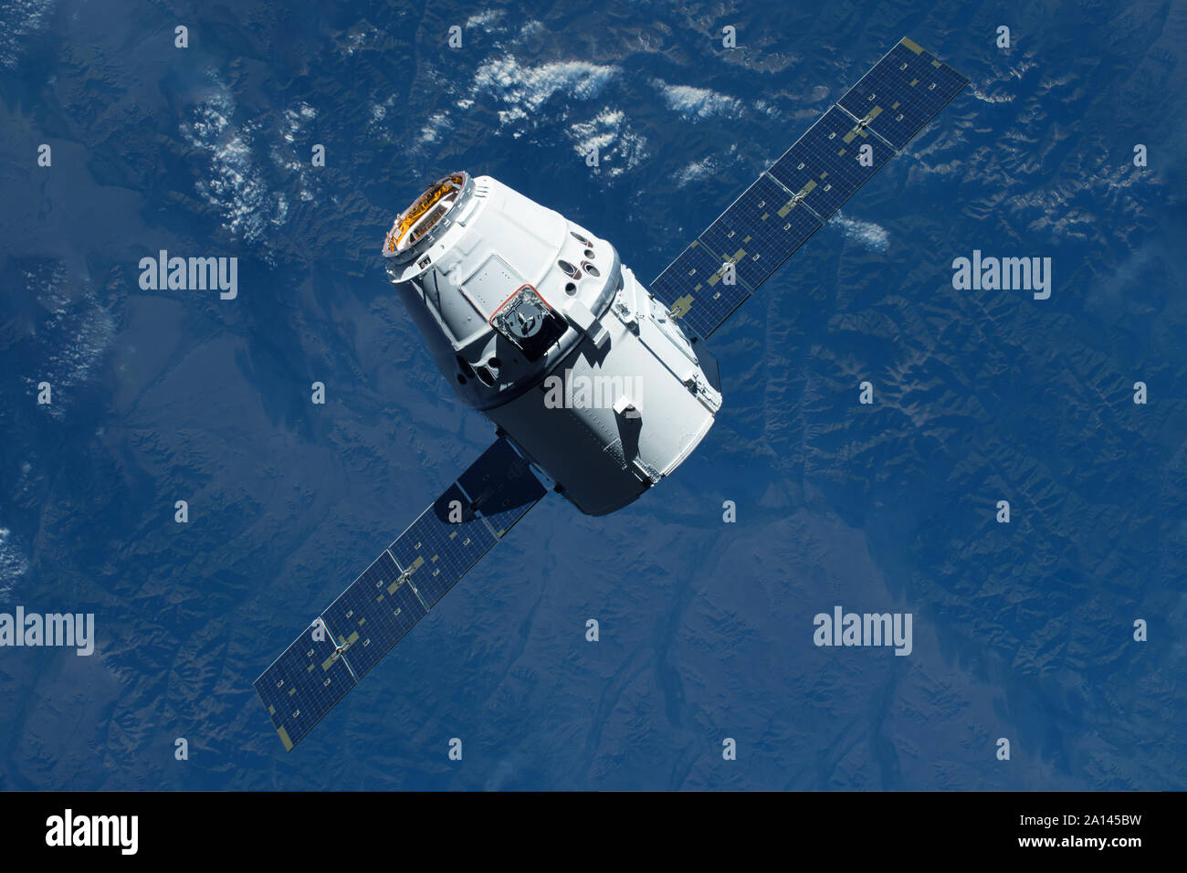 Space satellite in space above the earth. Elements of this image were ...
