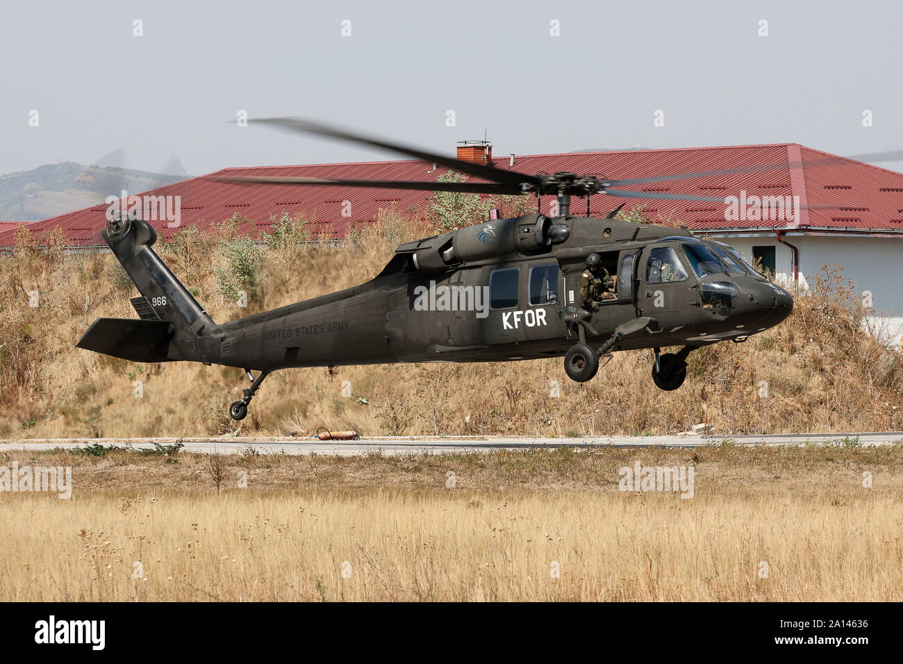 A U.S. Army UH-60 Black Hawk helicopter departs from Camp Butmir Stock ...