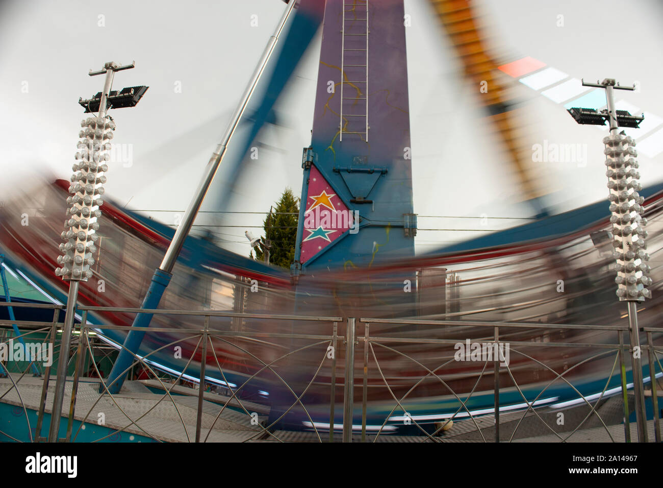 Light trail sweeps drawn by mechanical arm in motion mechanical games ...