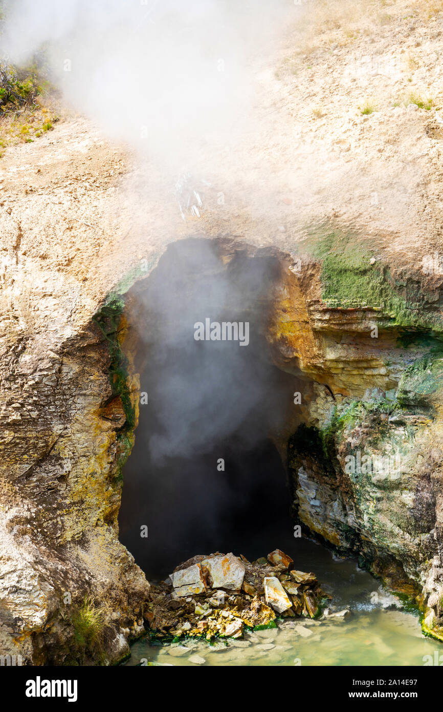 Steam rises from the Dragon's Mouth Spring cavern at Yellowstone ...