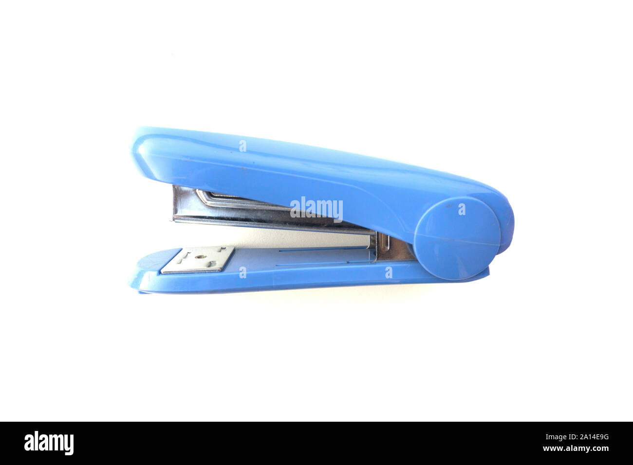 Blue stapler isolated on white background Stock Photo - Alamy