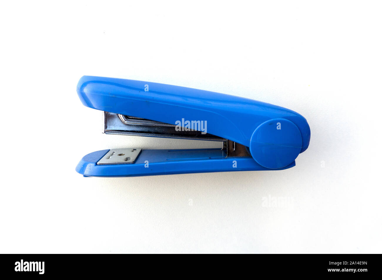 Blue stapler isolated on white background Stock Photo - Alamy