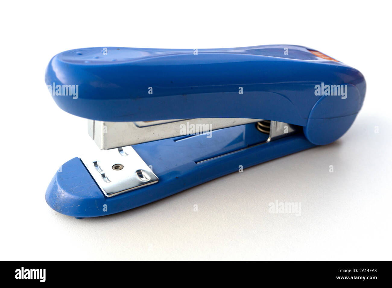 Blue stapler isolated on white background Stock Photo - Alamy