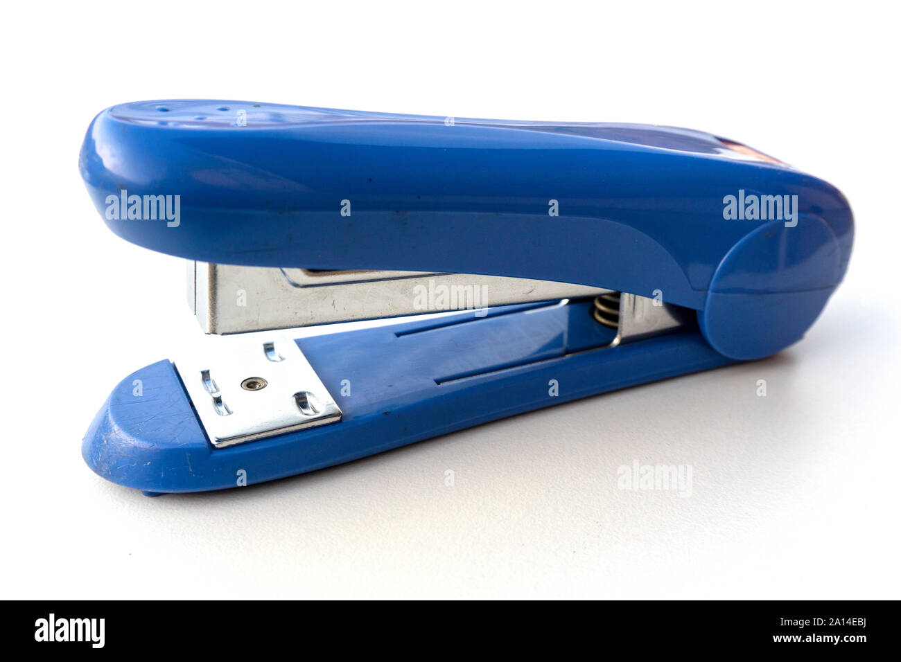 Blue stapler isolated on white background Stock Photo - Alamy