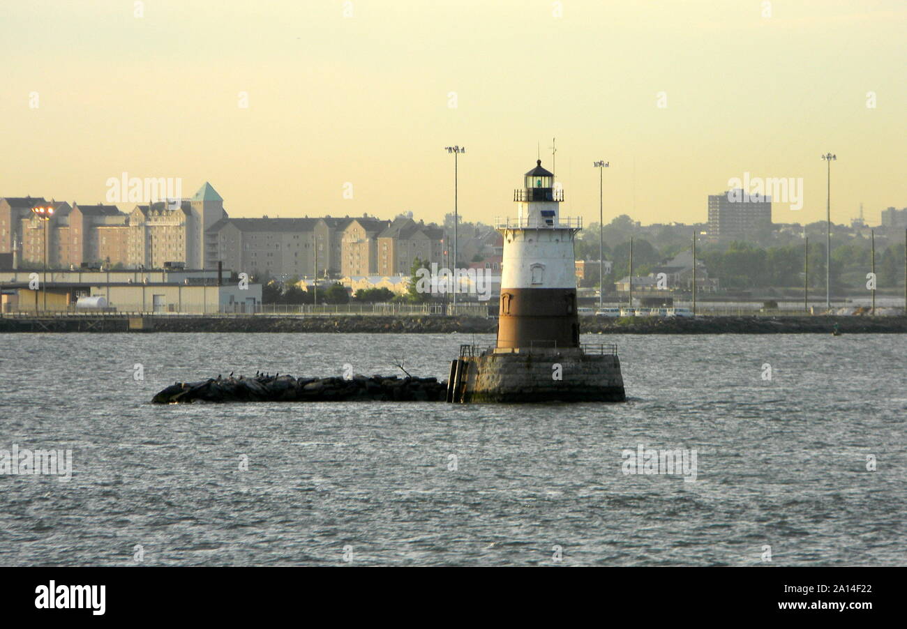 Robbins Reef Lighthouse in New York Harbor at sunset Stock Photo - Alamy
