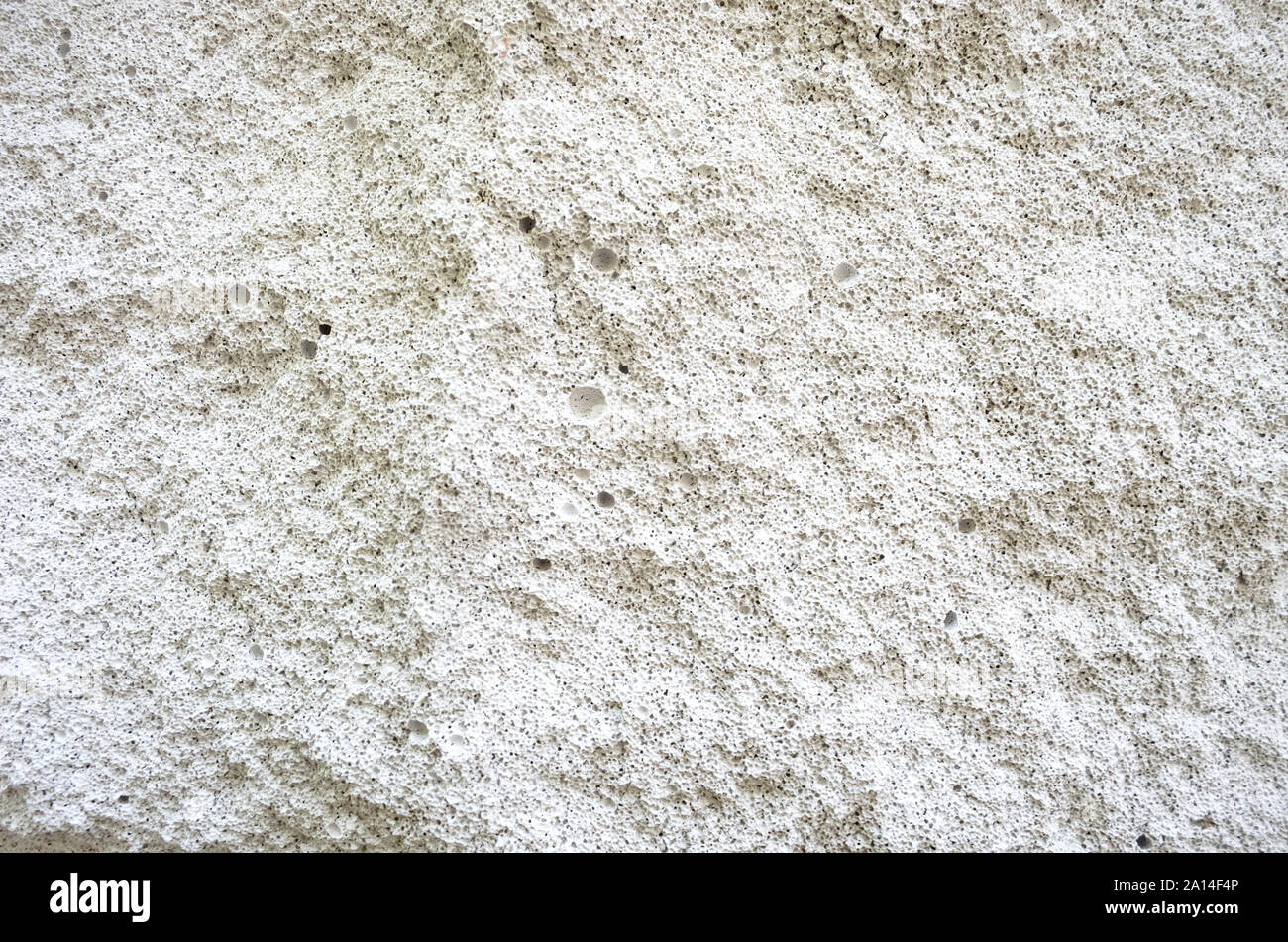 White background porous concrete wall. The texture of the dotted wall ...