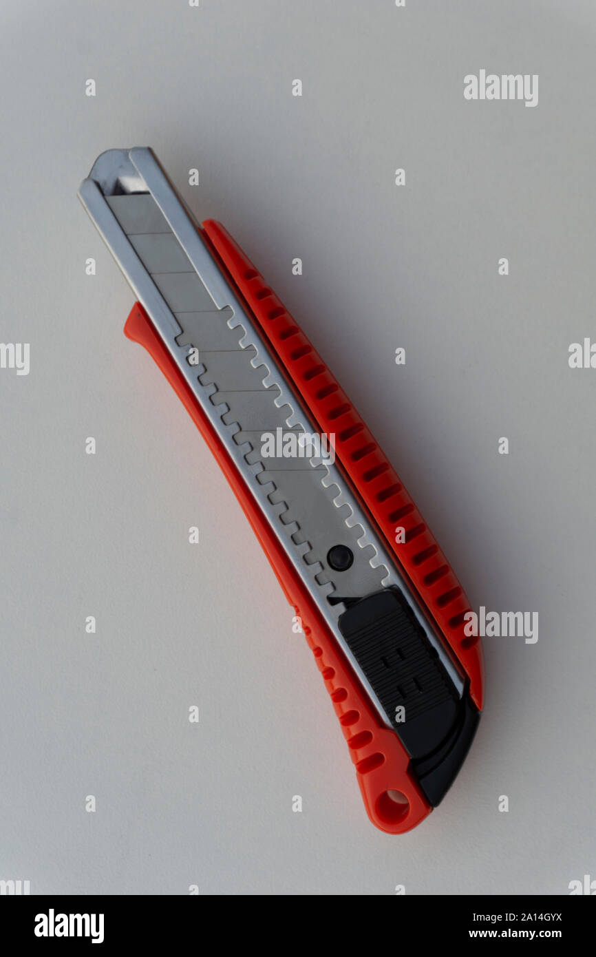 A red cutter isolated on white background Stock Photo - Alamy