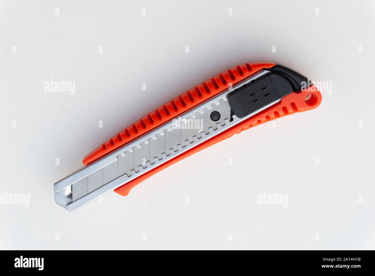 A red cutter isolated on white background Stock Photo - Alamy