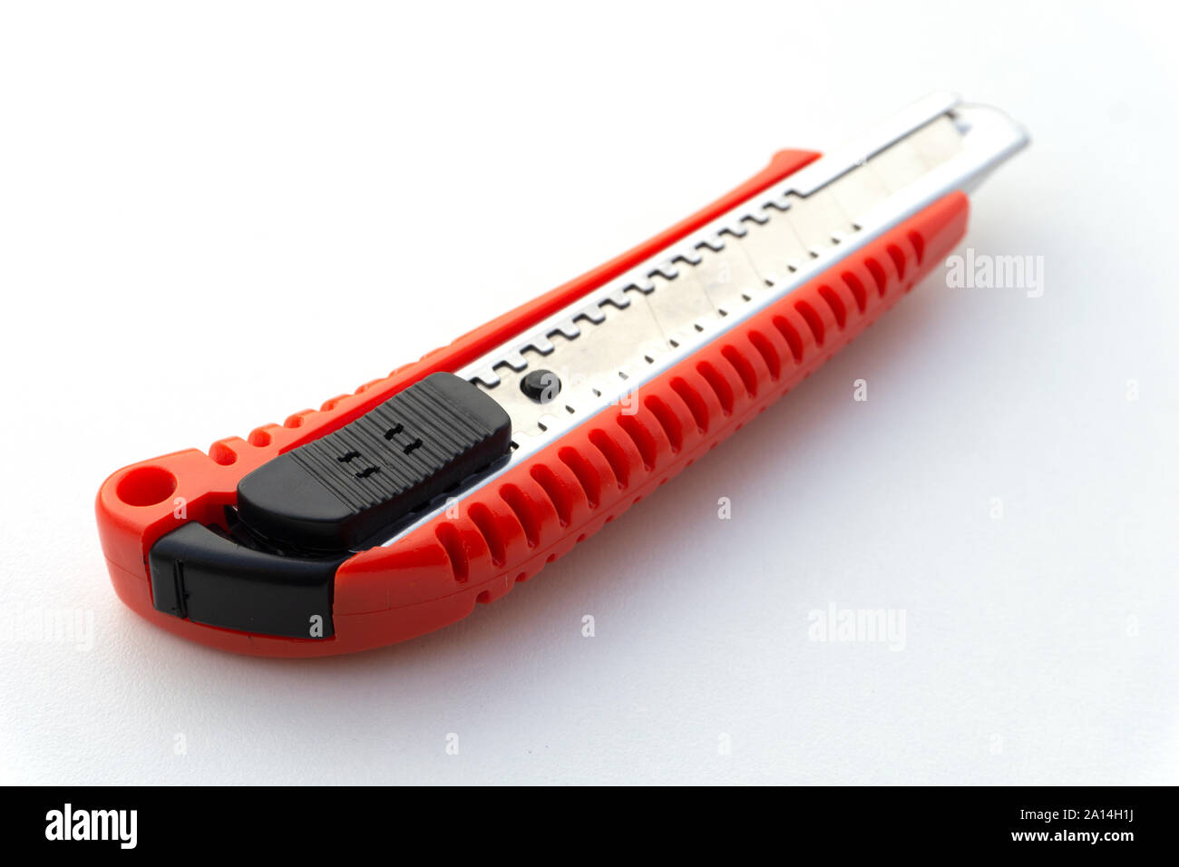 A red cutter isolated on white background Stock Photo - Alamy