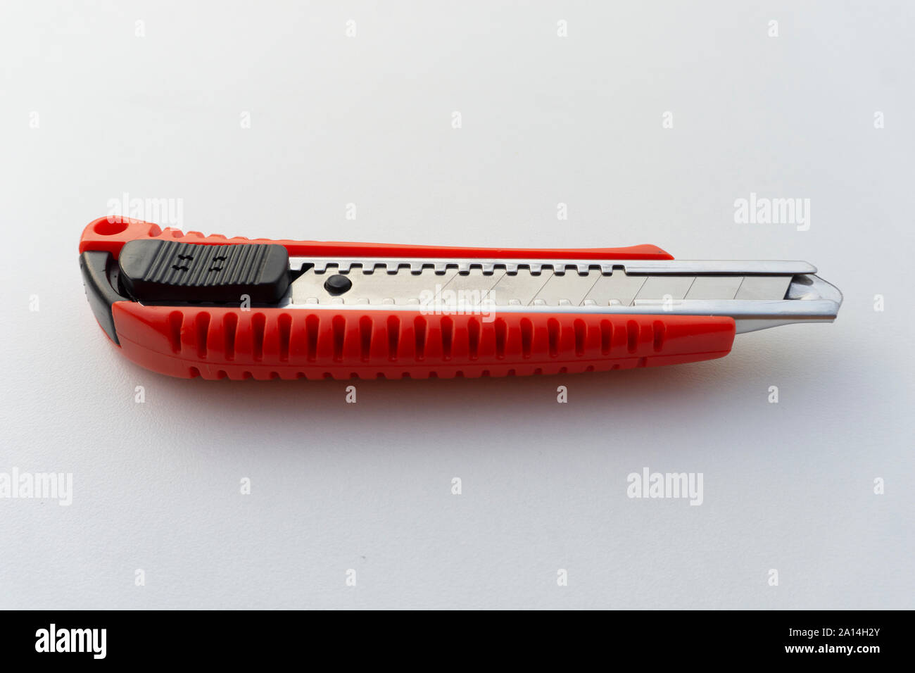 A red cutter isolated on white background Stock Photo - Alamy