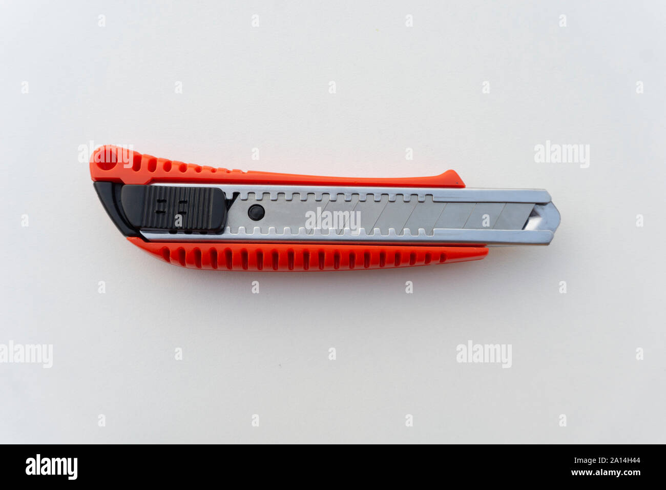 A red cutter isolated on white background Stock Photo - Alamy