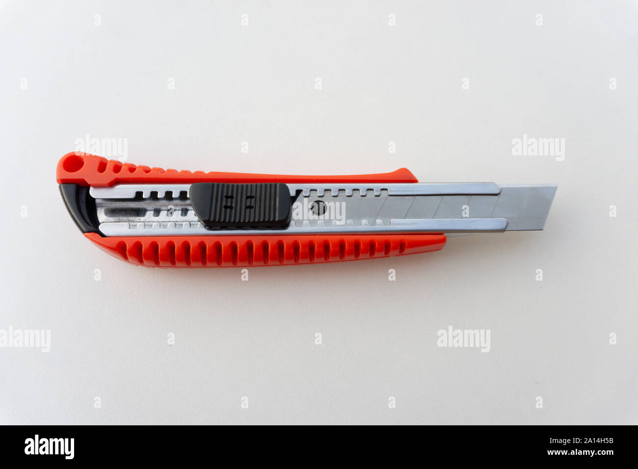 A red cutter isolated on white background Stock Photo - Alamy