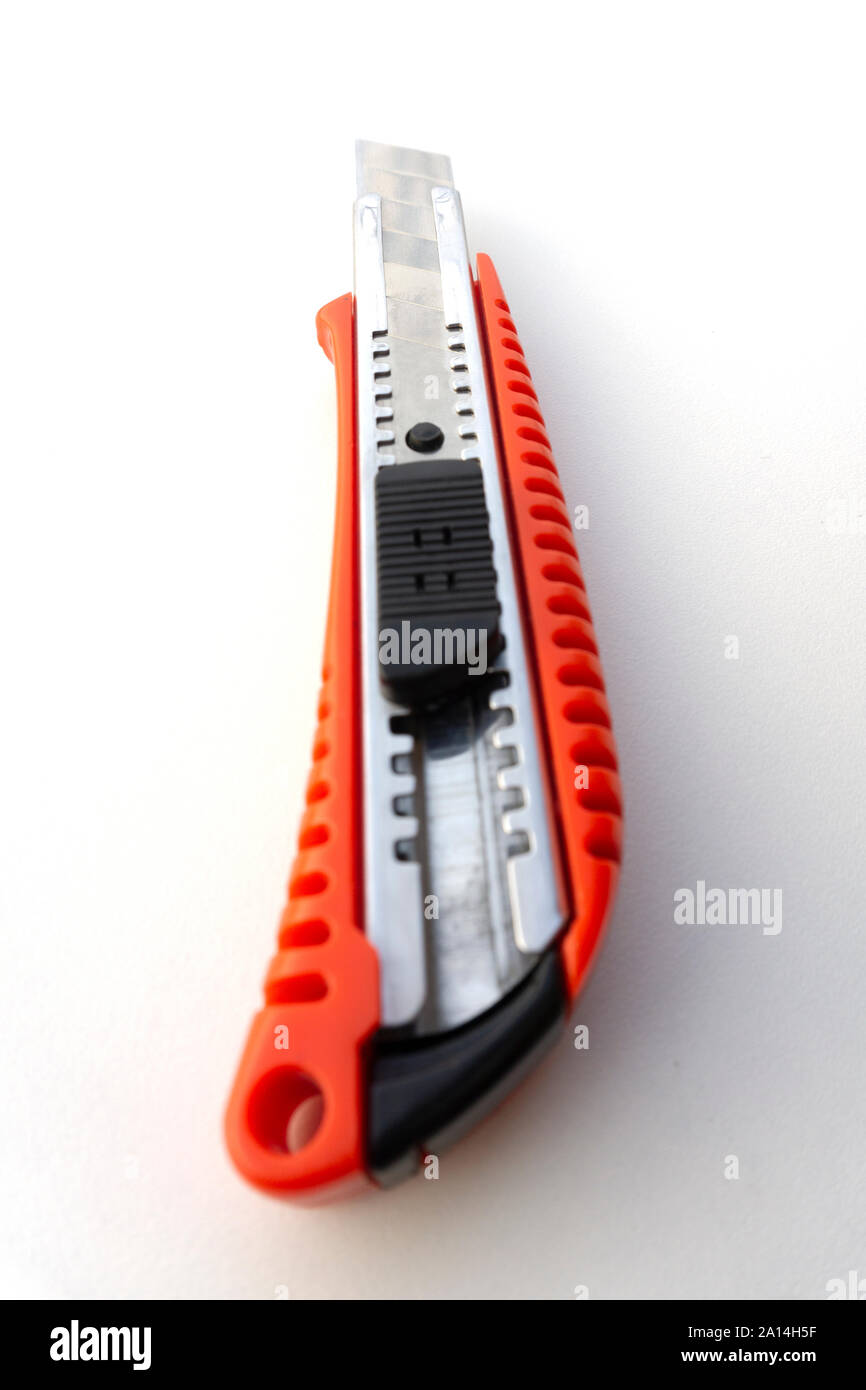 A red cutter isolated on white background Stock Photo - Alamy
