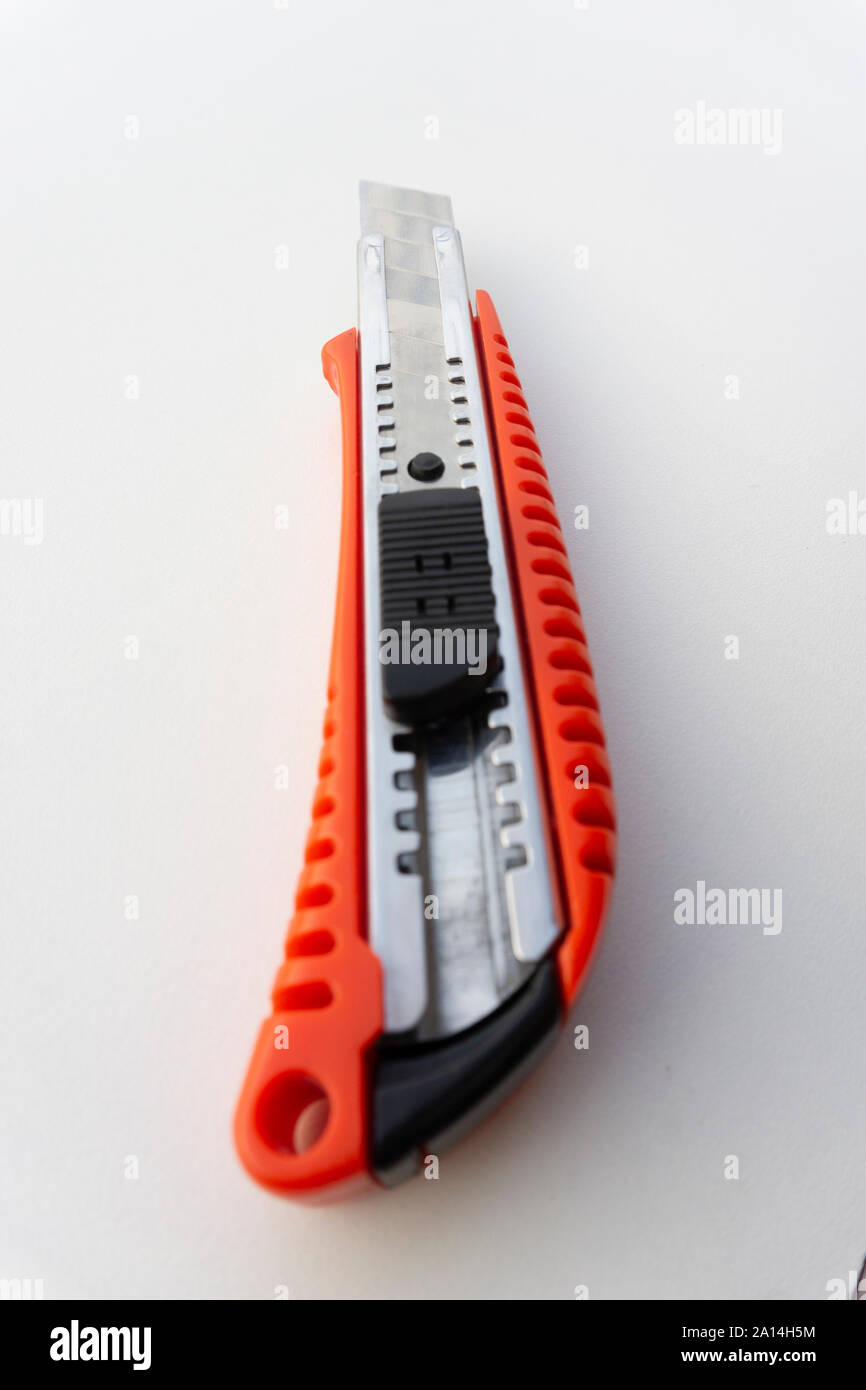 A red cutter isolated on white background Stock Photo - Alamy