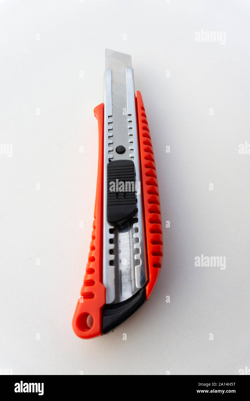 A red cutter isolated on white background Stock Photo - Alamy