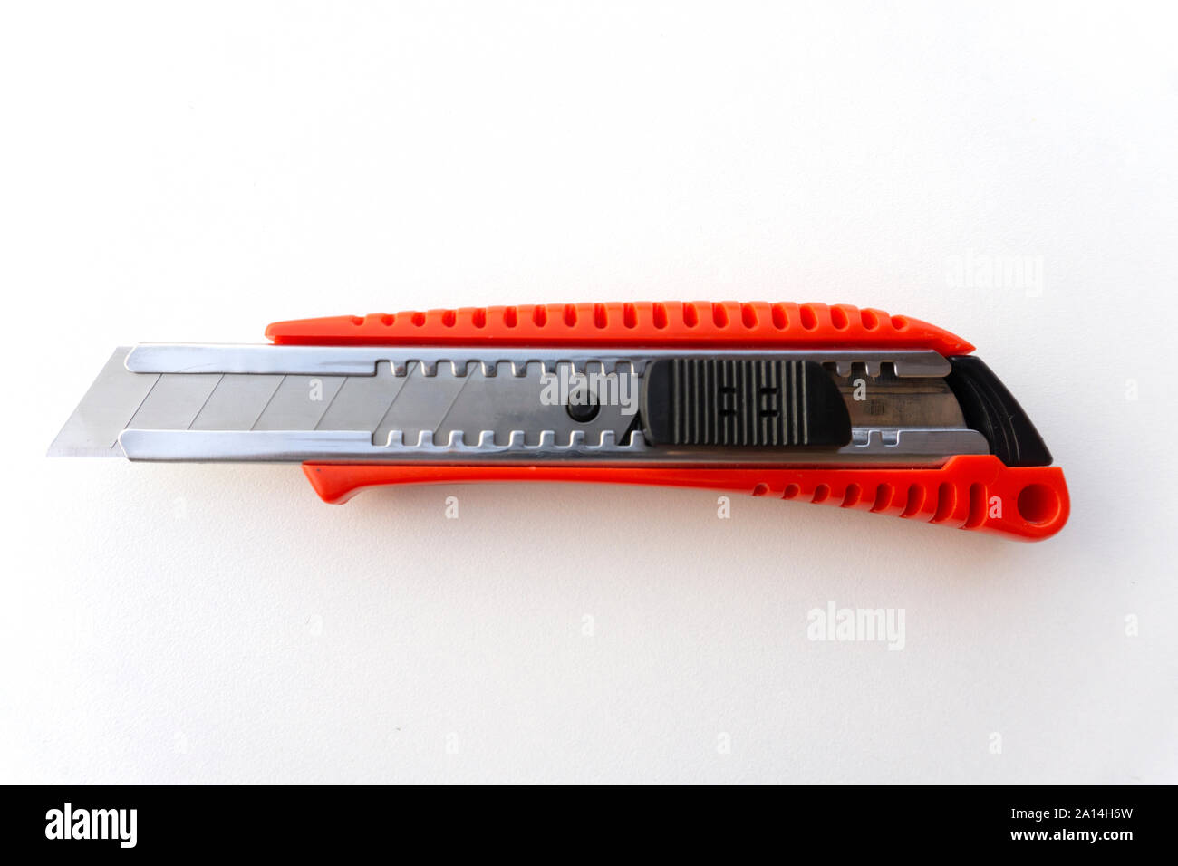 A red cutter isolated on white background Stock Photo - Alamy