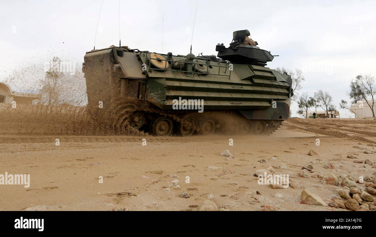 A U.S. Marine Amphibious Assault Vehicle moves to its objective Stock ...