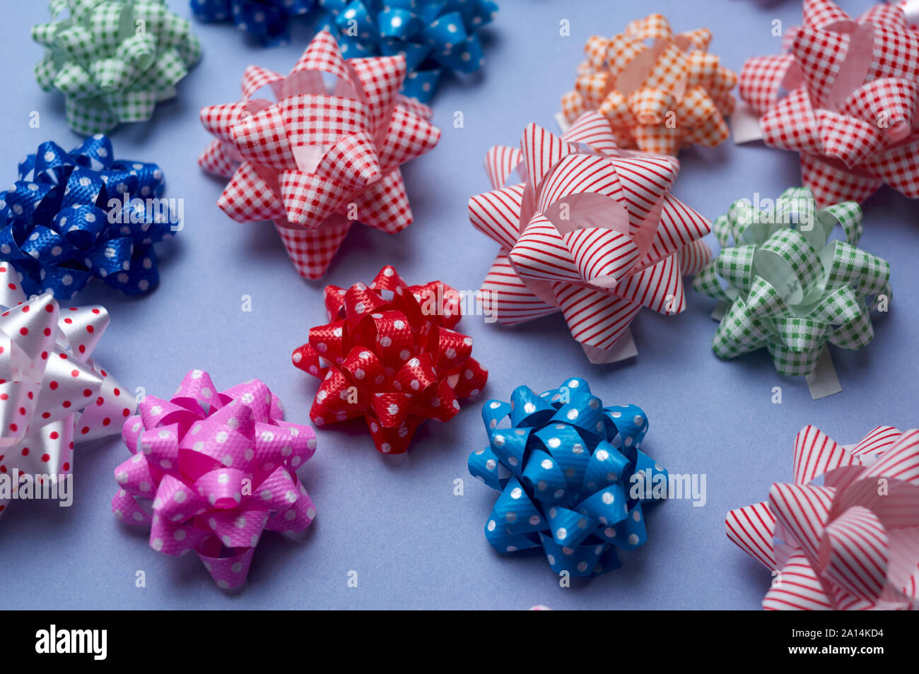 Colorful craft ribbon on the blue floor Stock Photo - Alamy