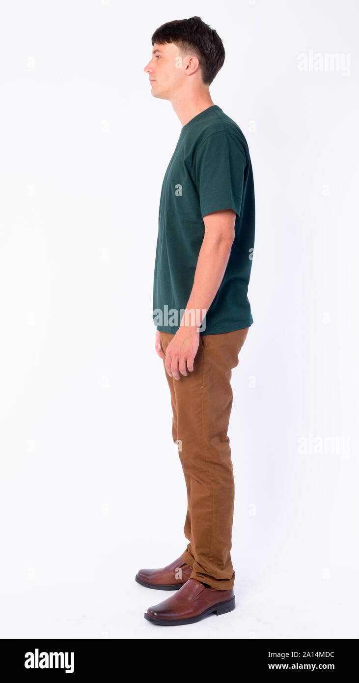 Full body shot profile view of young handsome man Stock Photo - Alamy