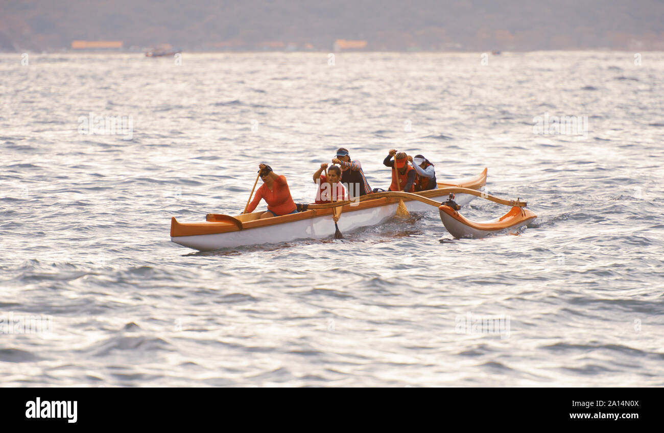Rio de Janeiro, Brazil - August 17 2013: Group of women paddling ...