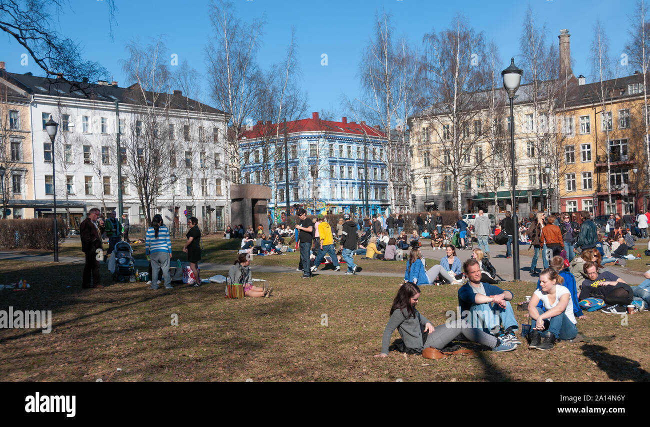 Oslo, Norway - April 11 2010: Norwegian people talking under the sun ...