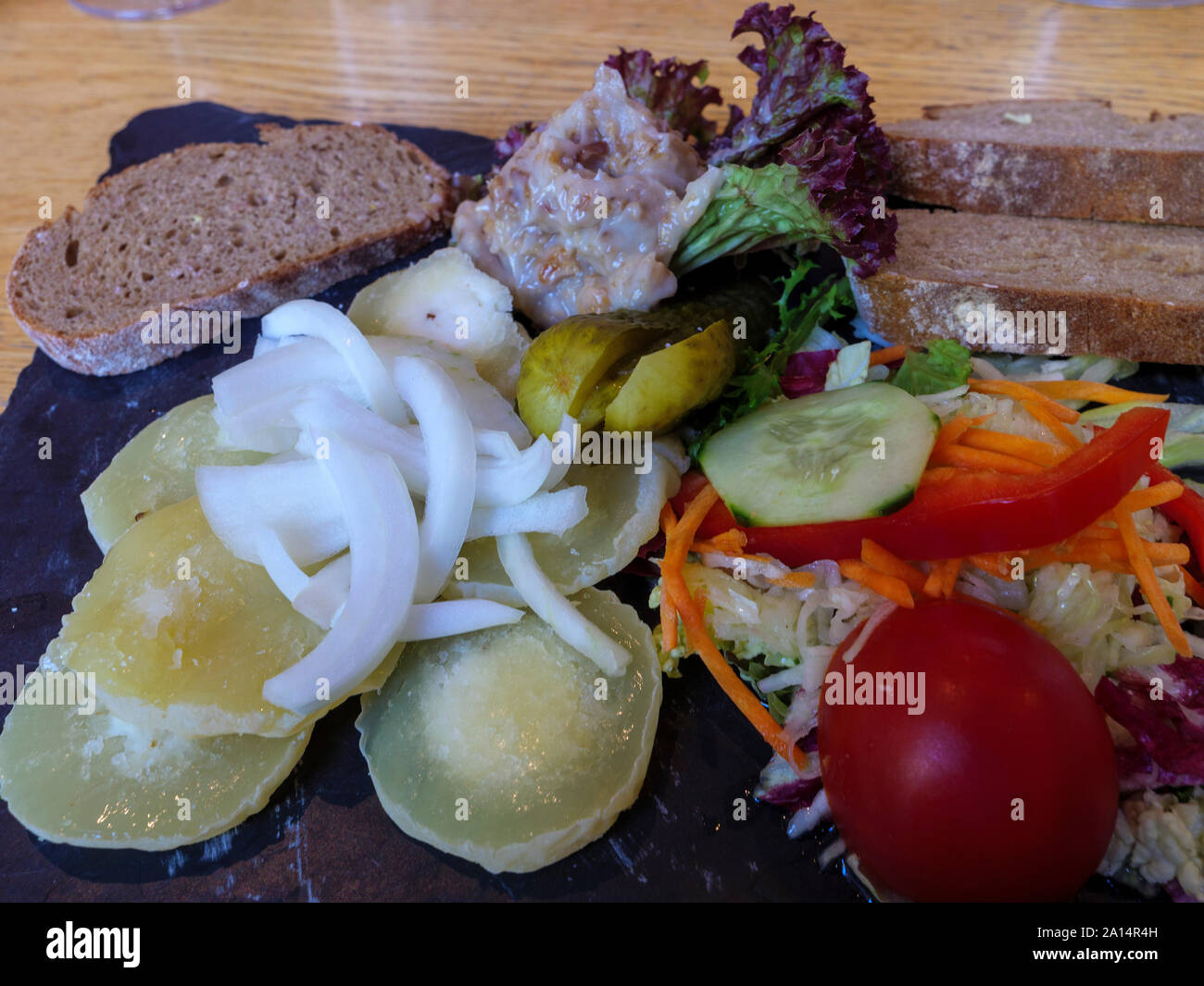 Local dish Harz cheese and Lard in restaurant Brauhaus, Goslar, Lower ...