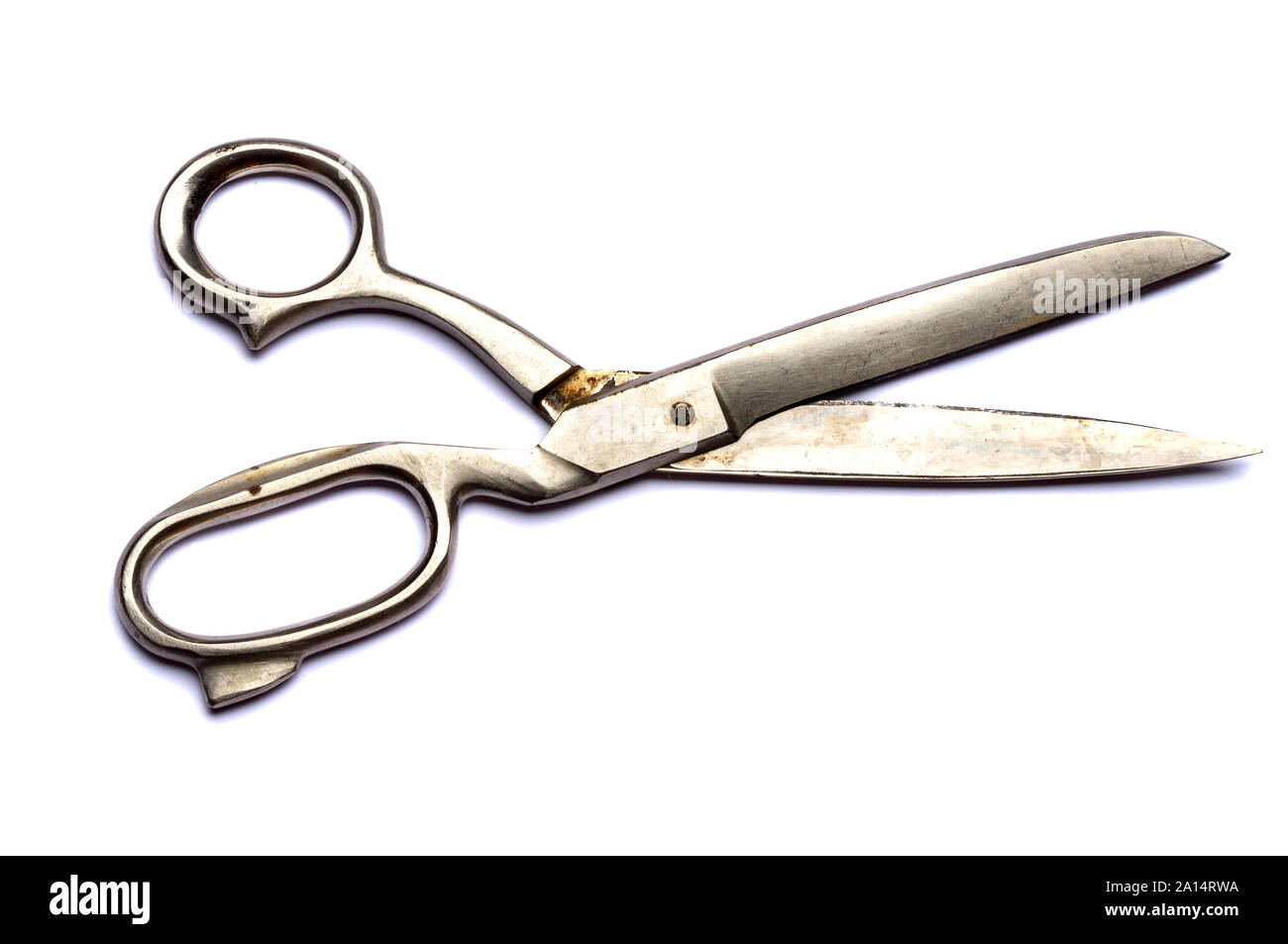 Big old rust iron scissors isolated on white background Stock Photo - Alamy