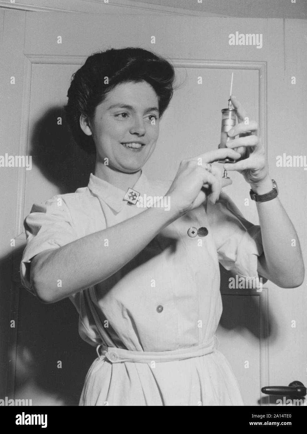Historic nurse with syringe hi-res stock photography and images - Alamy