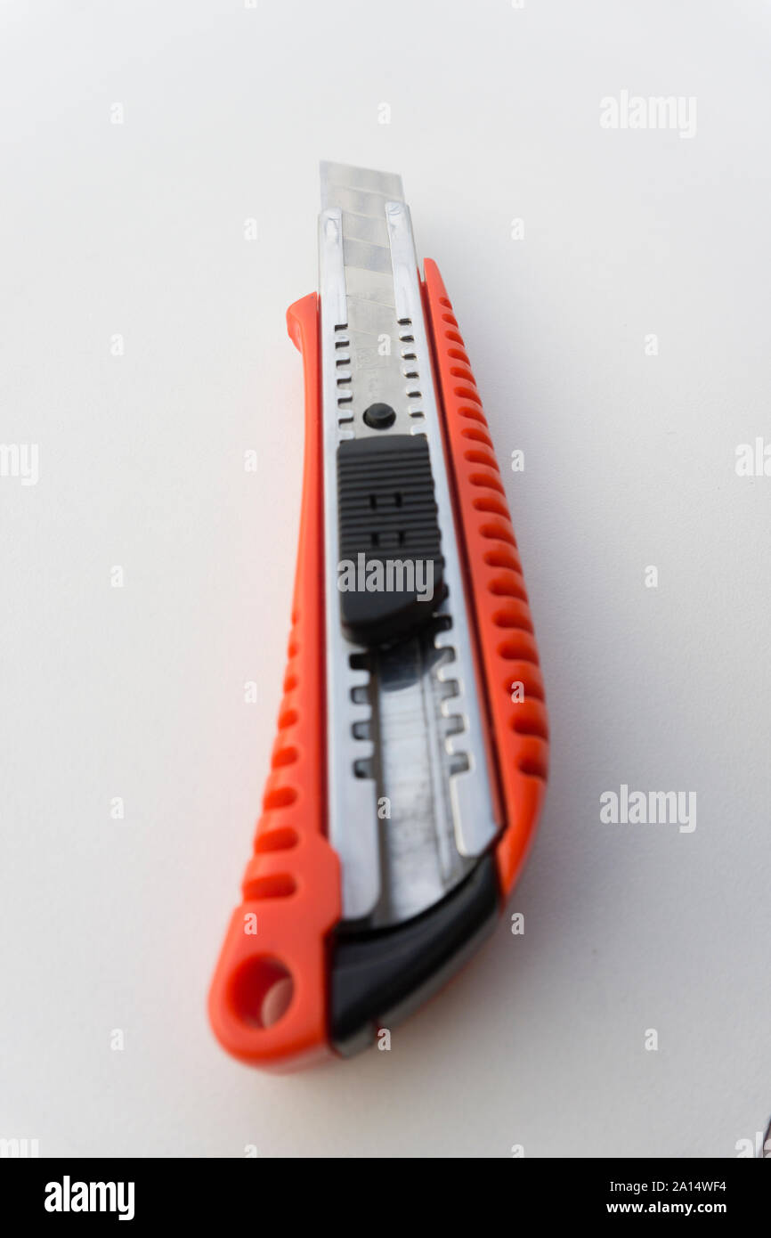 A red cutter isolated on white background Stock Photo - Alamy