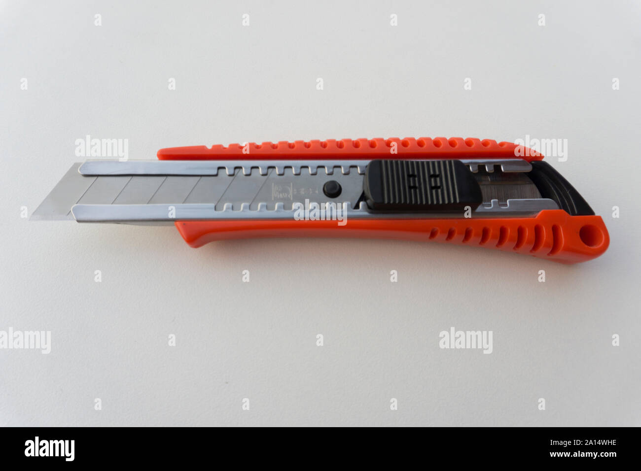 A red cutter isolated on white background Stock Photo - Alamy