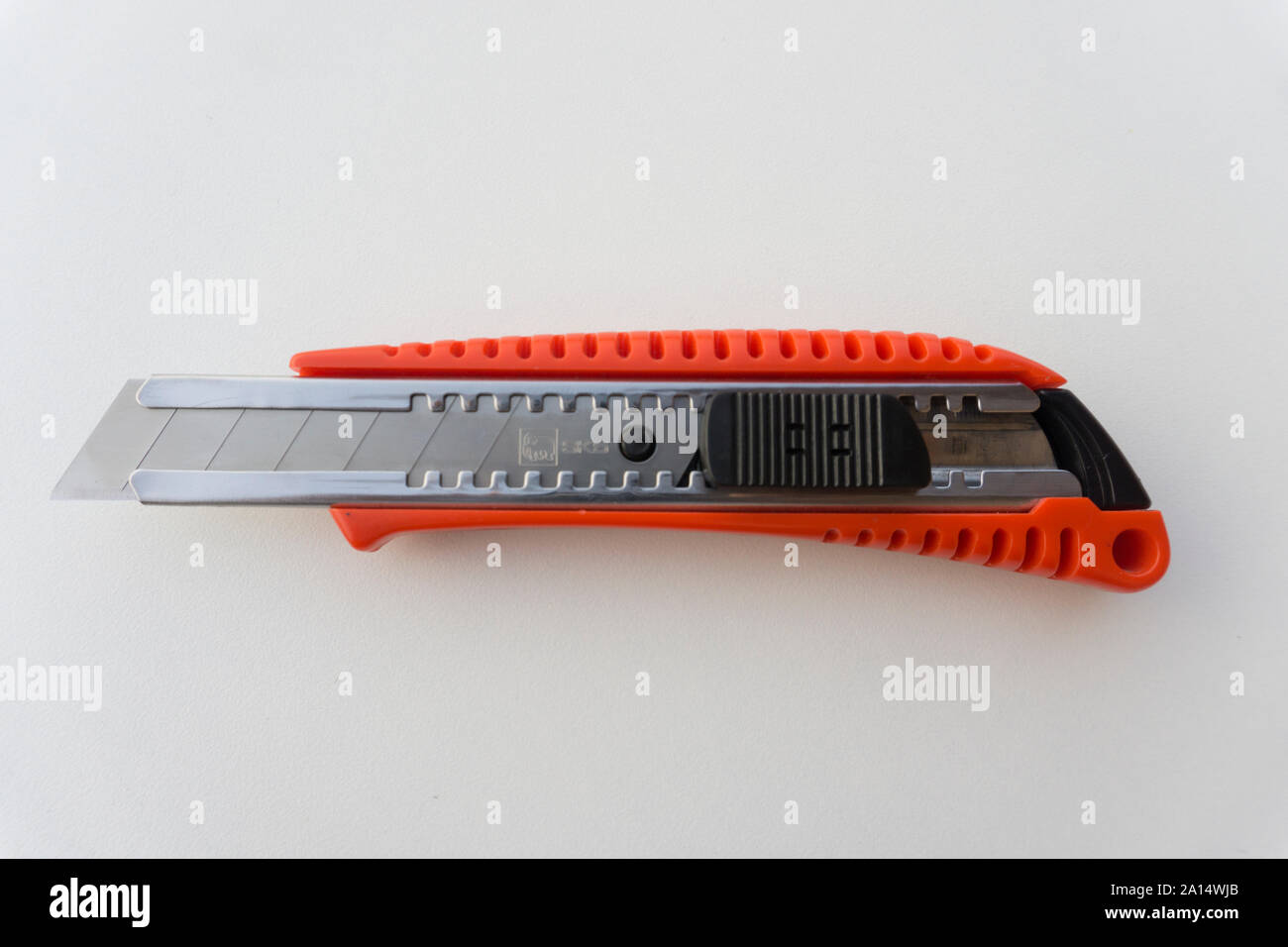 A red cutter isolated on white background Stock Photo - Alamy