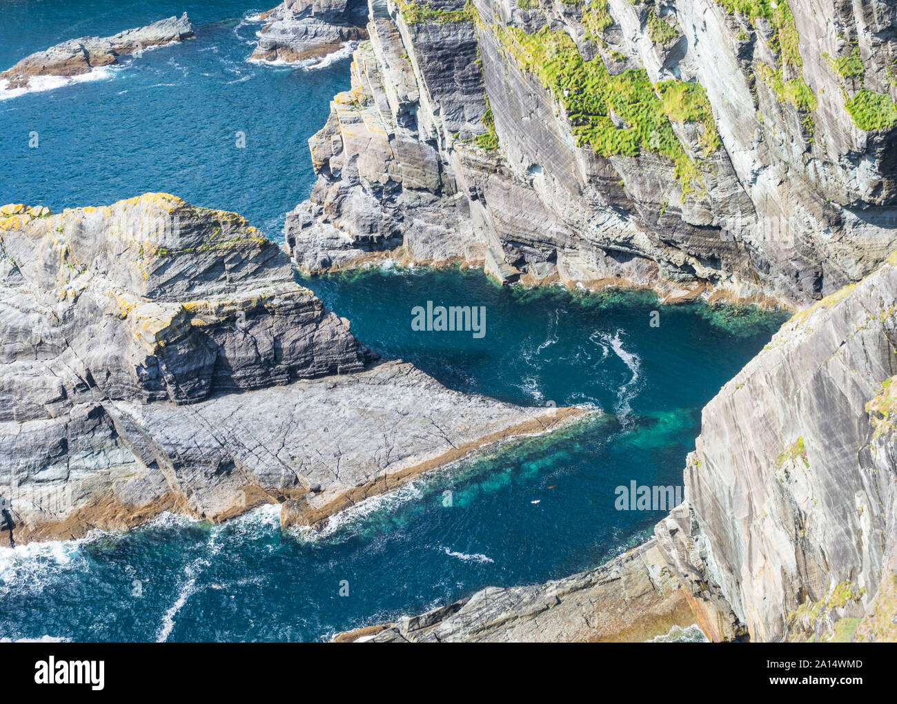 The spectacular Kerry Cliffs are located on the Skellig Coast in County ...