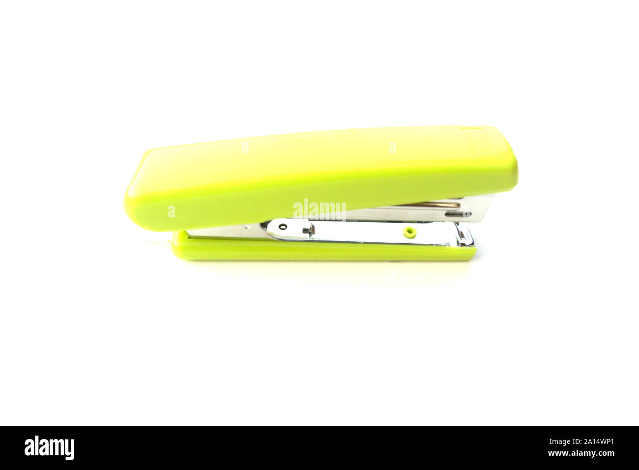 Green stapler isolated on white background Stock Photo - Alamy