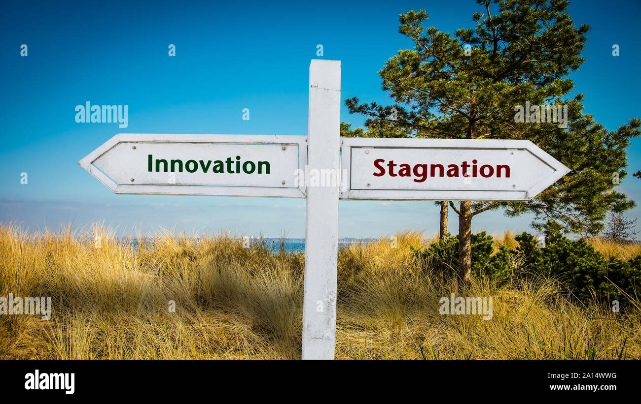 Street Sign the Direction Way to Innovation versus Stagnation Stock ...