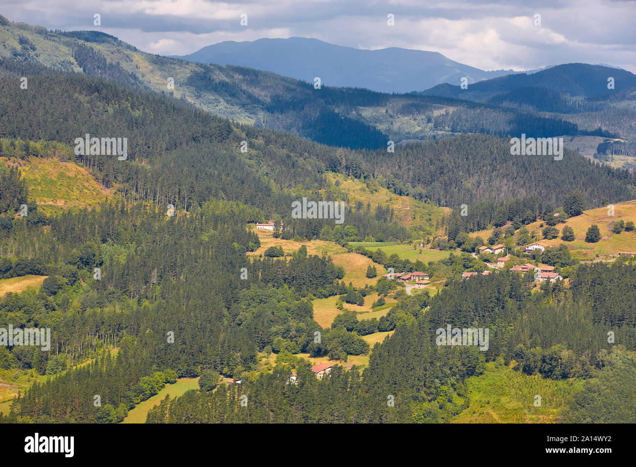 Basque country valley surrounded by forest and mountains. Spanish ...