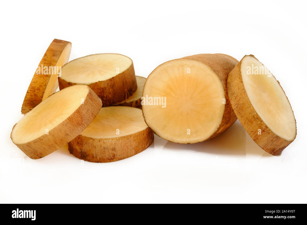 sliced yacon roots on white background Stock Photo - Alamy