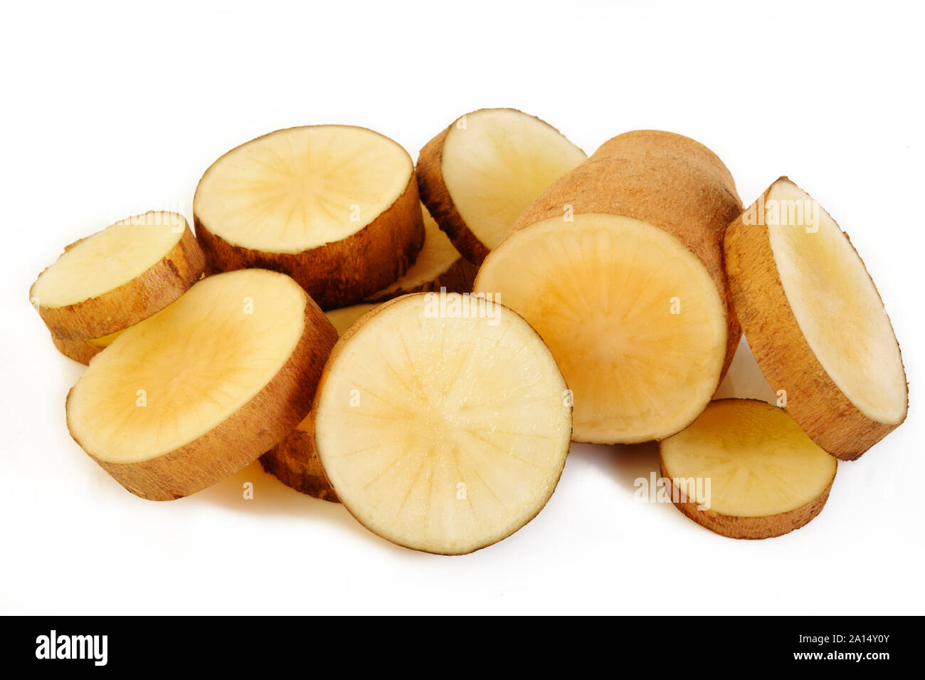 sliced yacon roots on white background Stock Photo - Alamy