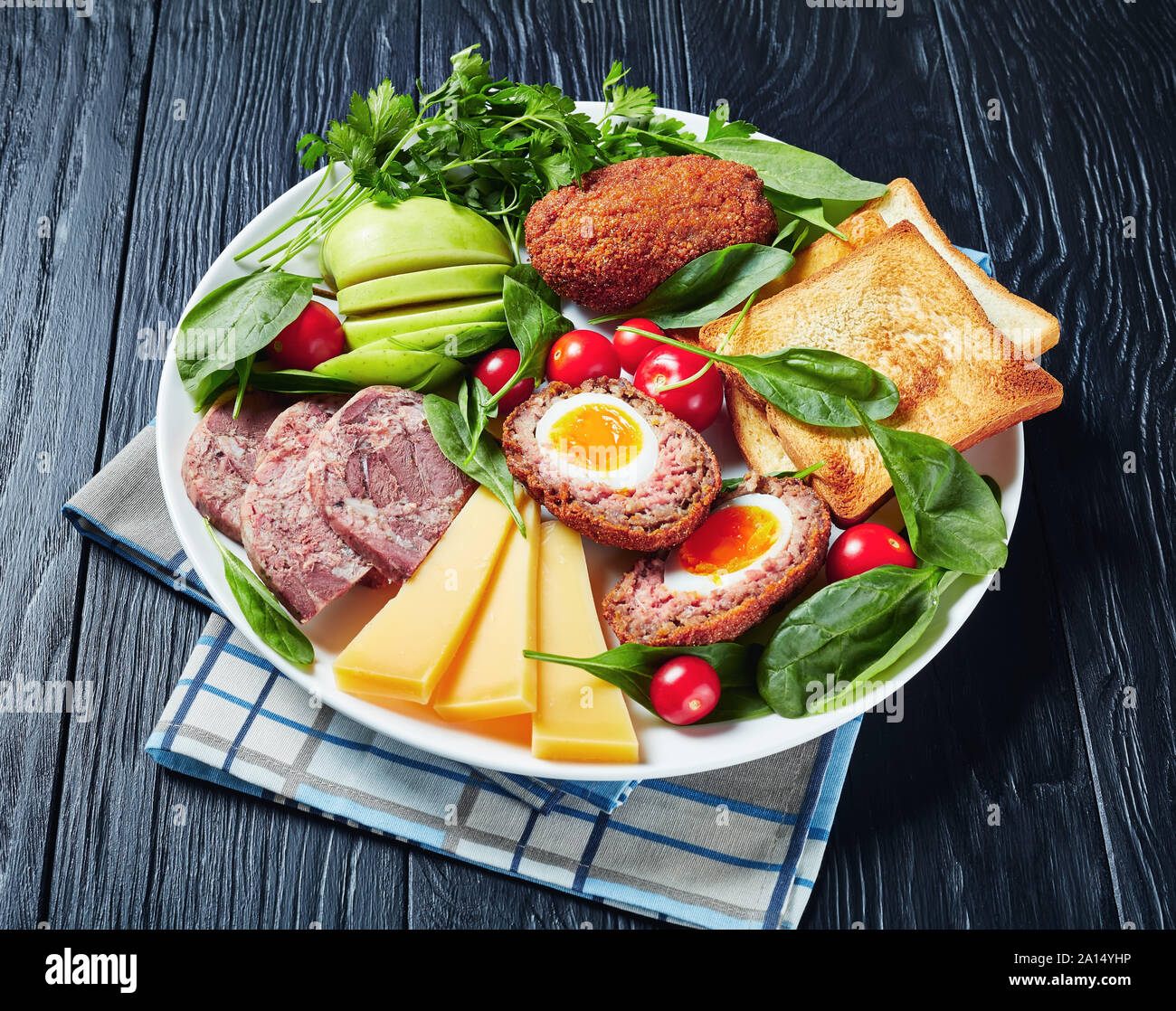 toasts, cheddar cheese, apple, scotch eggs, sliced head cheese ...